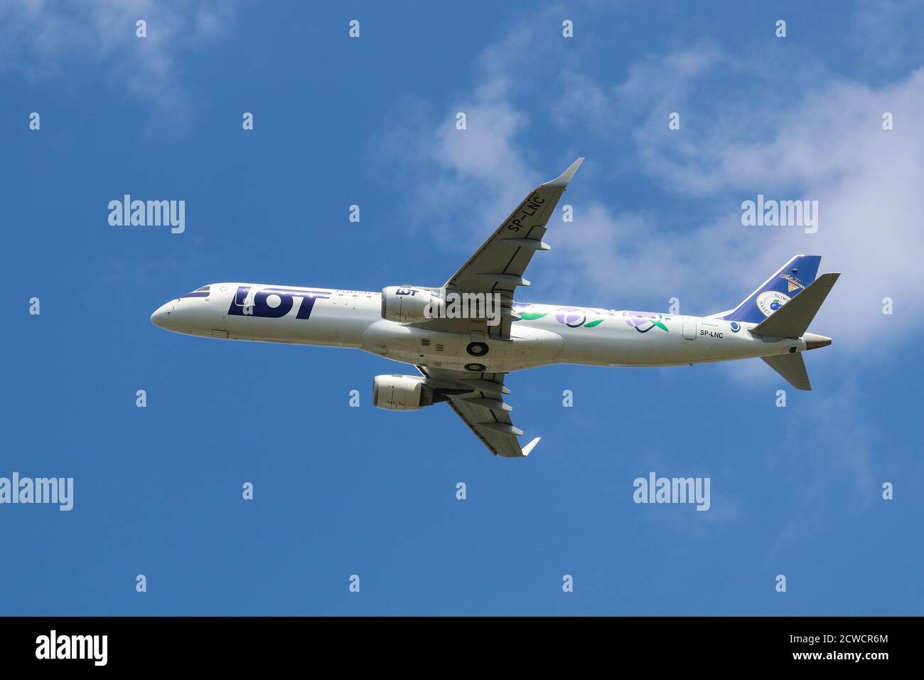 Polish airlines LOT Embraer 195 LR jetliner on the climbout after take ...