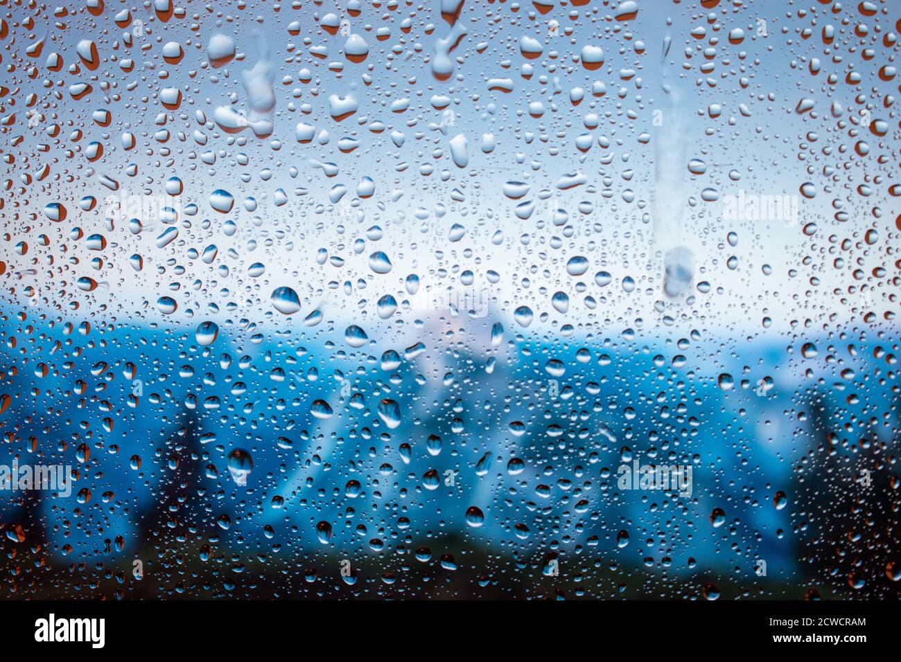 Skylines,Mountains, Raindrops on Window Glass Stock Photo - Alamy