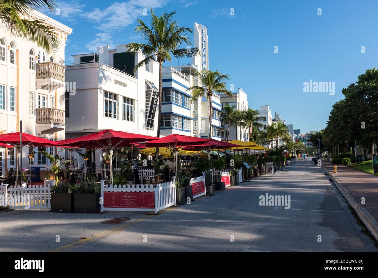 Cafes and restaurants take over the street on Ocean Drive without any ...