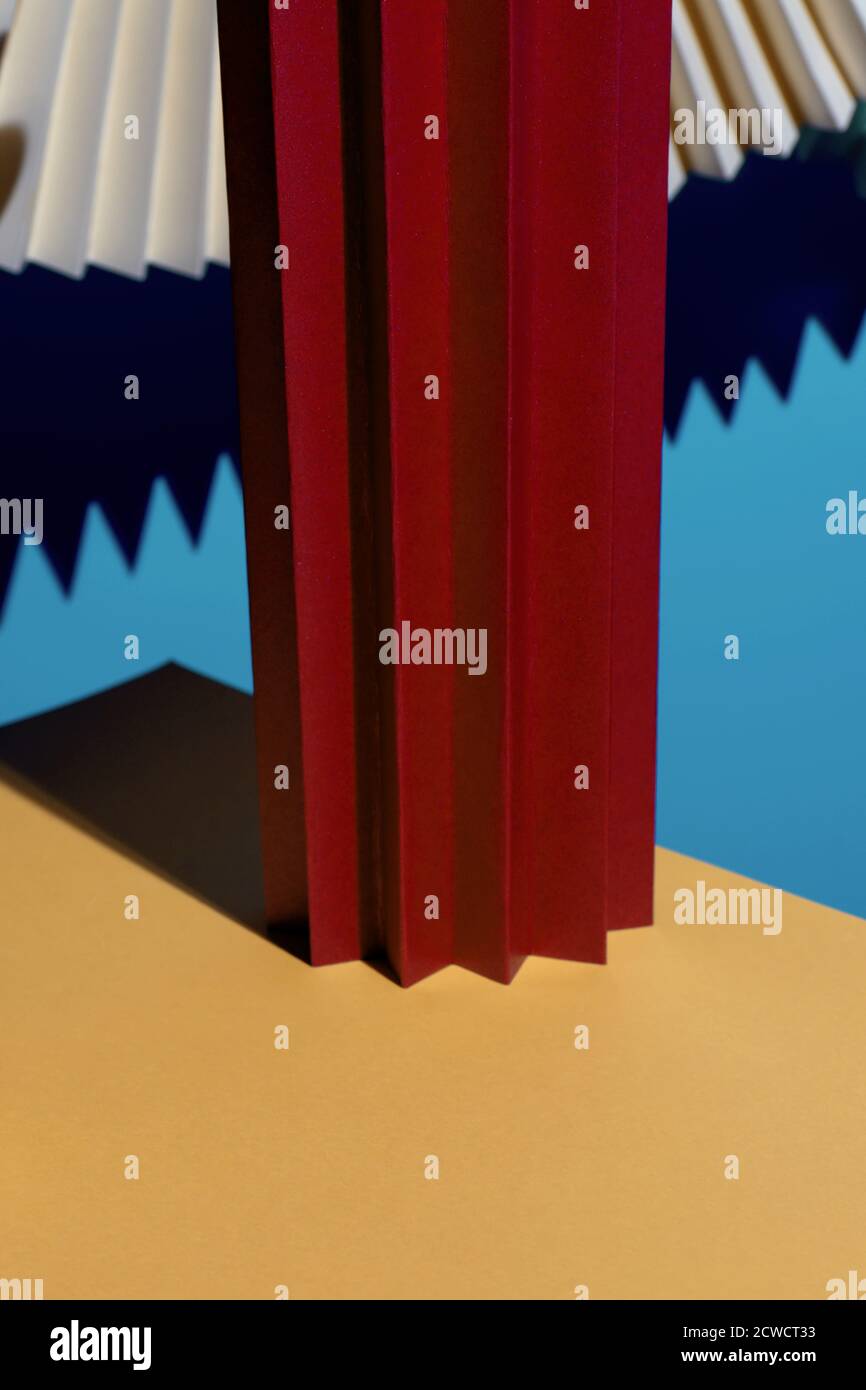 Modern multi-colored composition of fans, shadows and cardboard ...