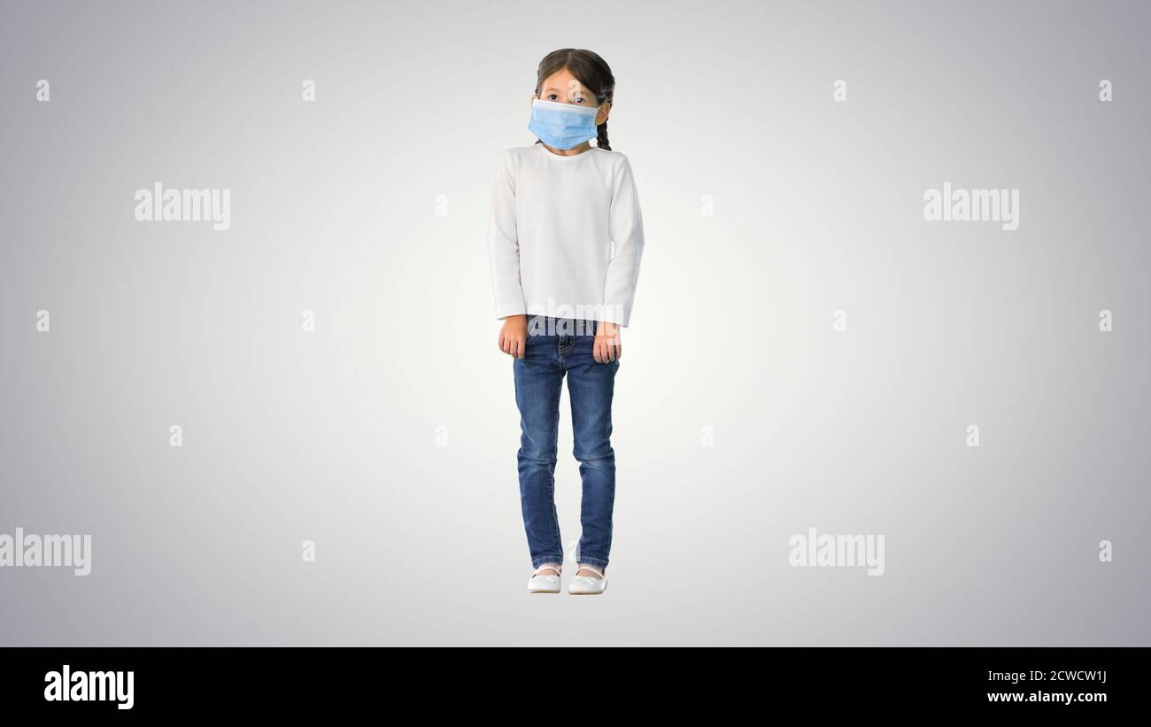 Child taking face mask off hi-res stock photography and images - Alamy