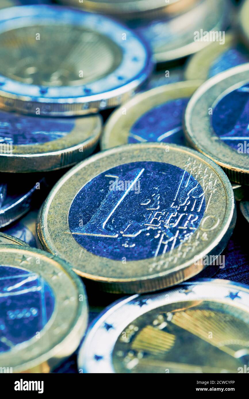 colored picture background with one and two Euro coins, format filling ...