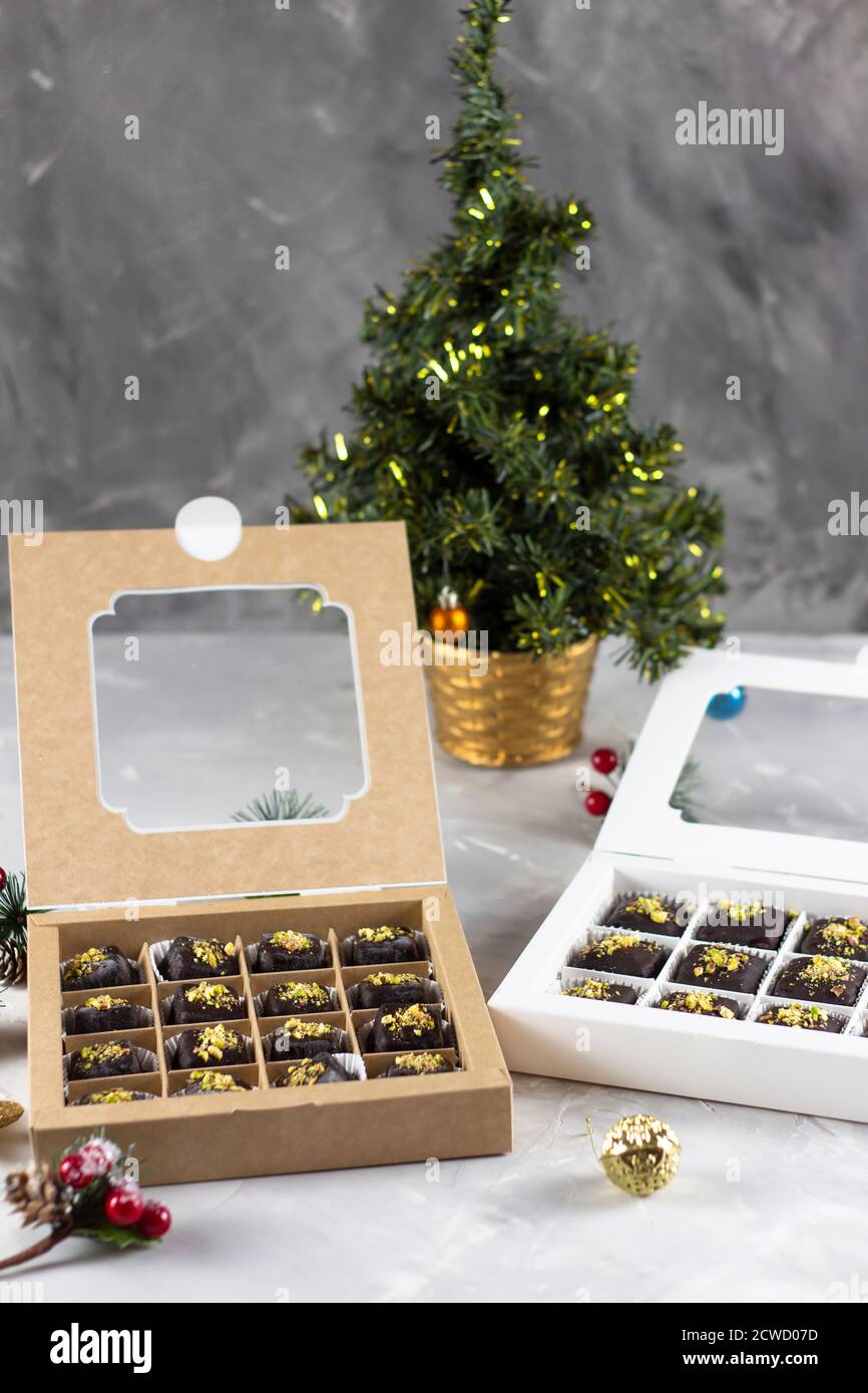 Pp sweets in chocolate. Healthy candies made from live fruits. Proper ...