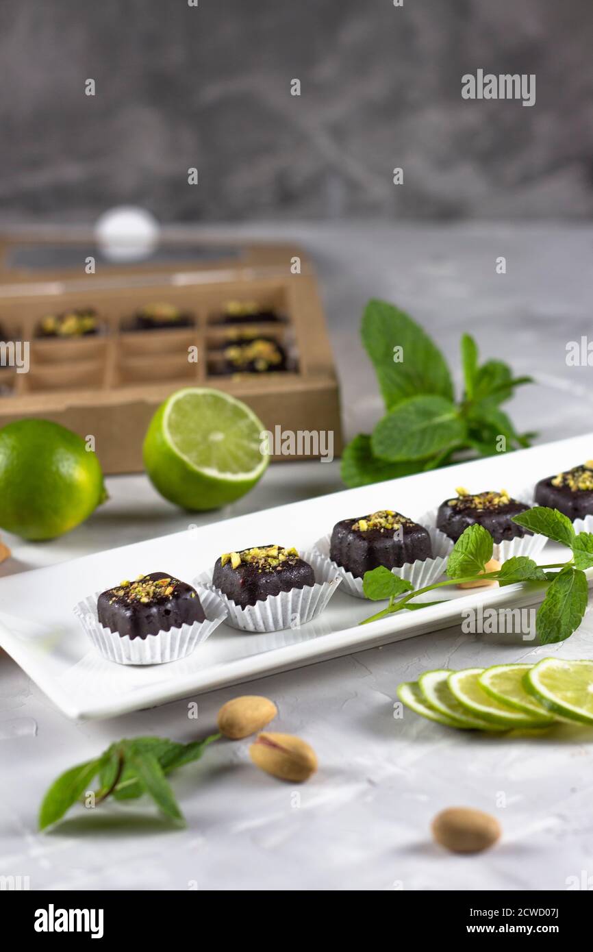 Pp sweets in chocolate. Healthy candies made from live fruits. Proper ...