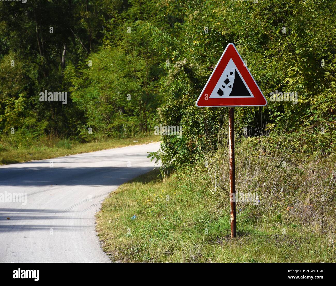 Road sign that warns drivers of possible landslide on the road Stock ...