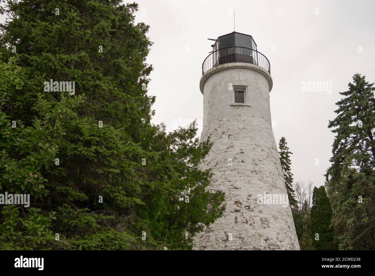 The old Presque Isle Lighthouse on the remote shores of Lake Huron. The ...