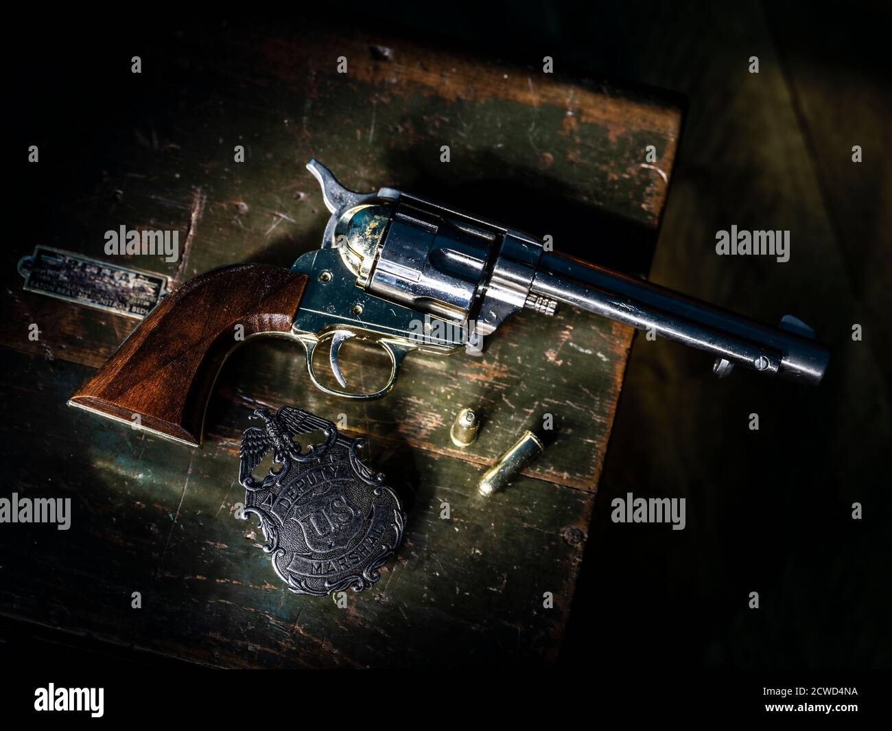 US Deputy Marshal Badge and Peacemaker Gun and Bullets Stock Photo - Alamy