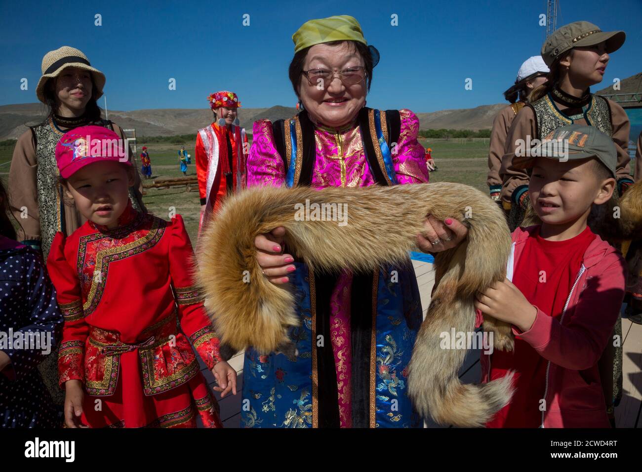 Buryat woman shows fur during the international ethno-cultural festival ...