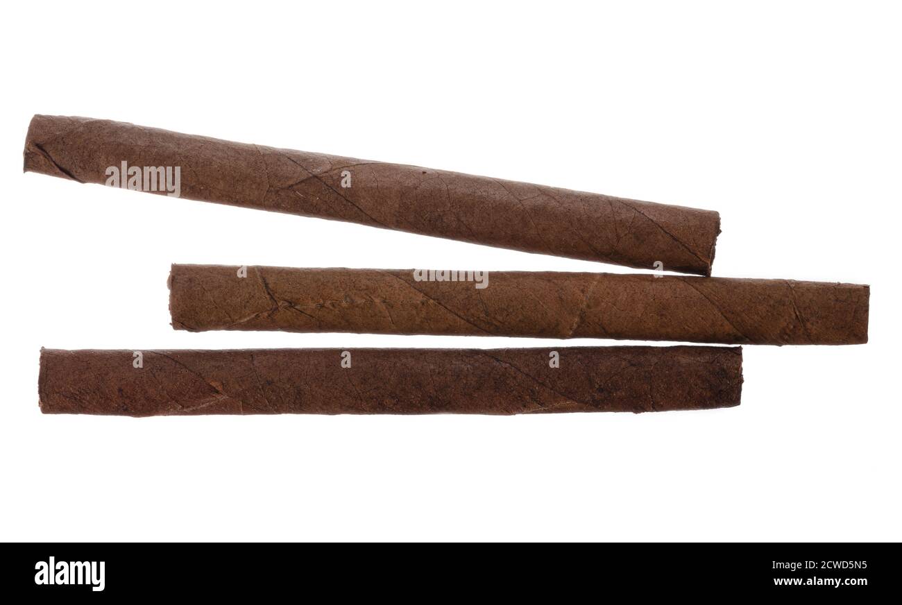 Hand rolled cigars isolated on white background Stock Photo - Alamy