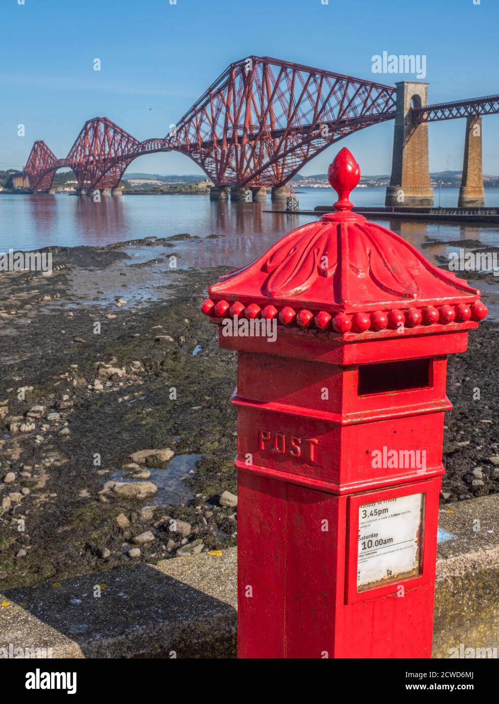 A Bright Red Vintage British Post Box In Front Of The Iconic Forth Rail ...