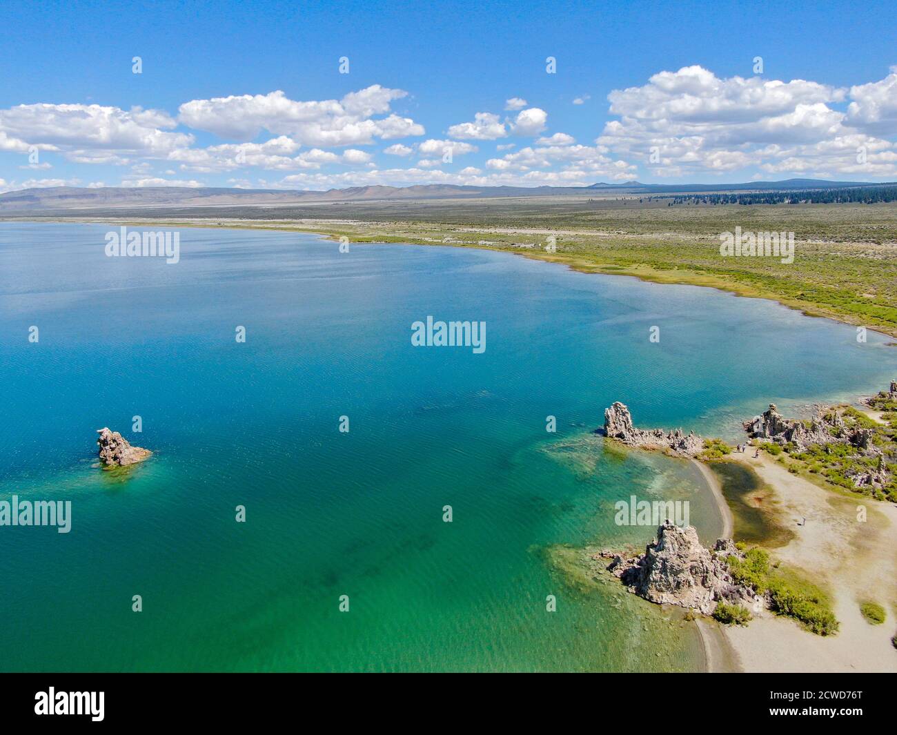 Aerial view of Mono Lake with tufa rock formations during summer season ...