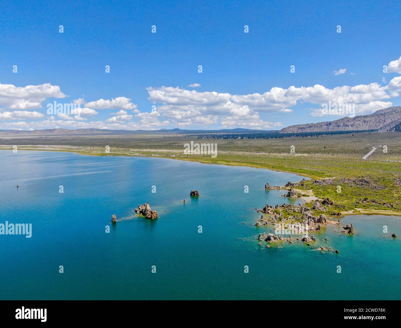 Aerial view of Mono Lake with tufa rock formations during summer season ...