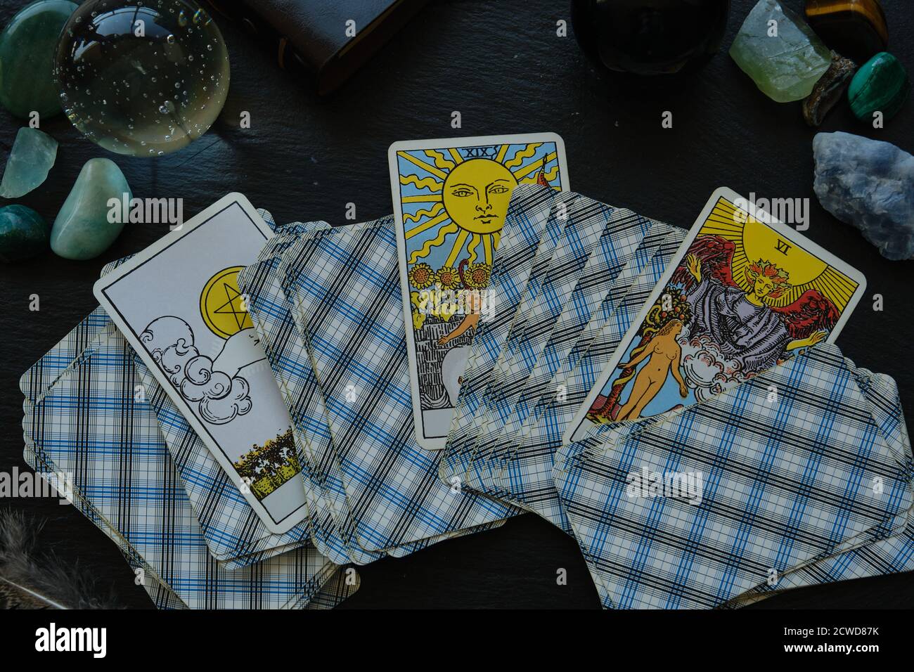 Tarot cards on the table Stock Photo - Alamy
