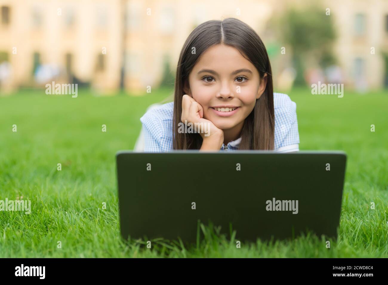 happy kid working on laptop. online education. back to school. teen ...