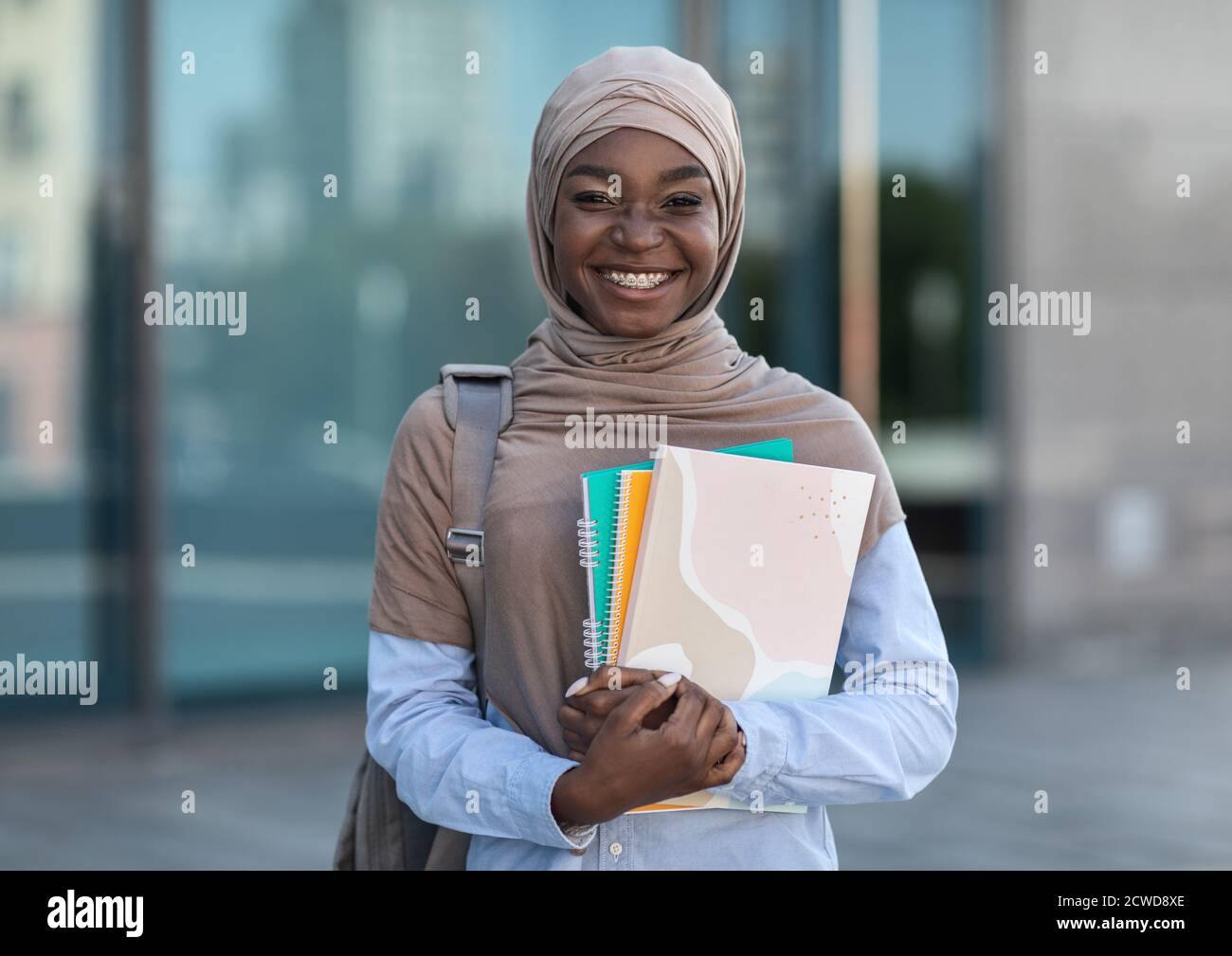 Education For Muslim Women. Smiling african islamic female college ...