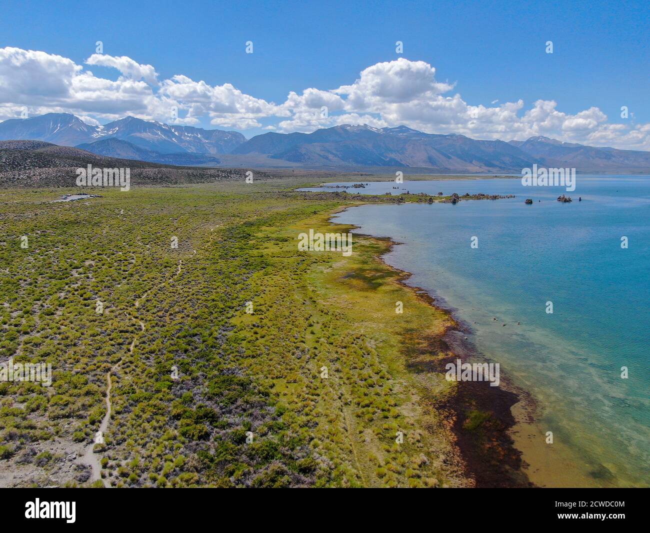 Aerial view of Mono Lake with tufa rock formations during summer season ...