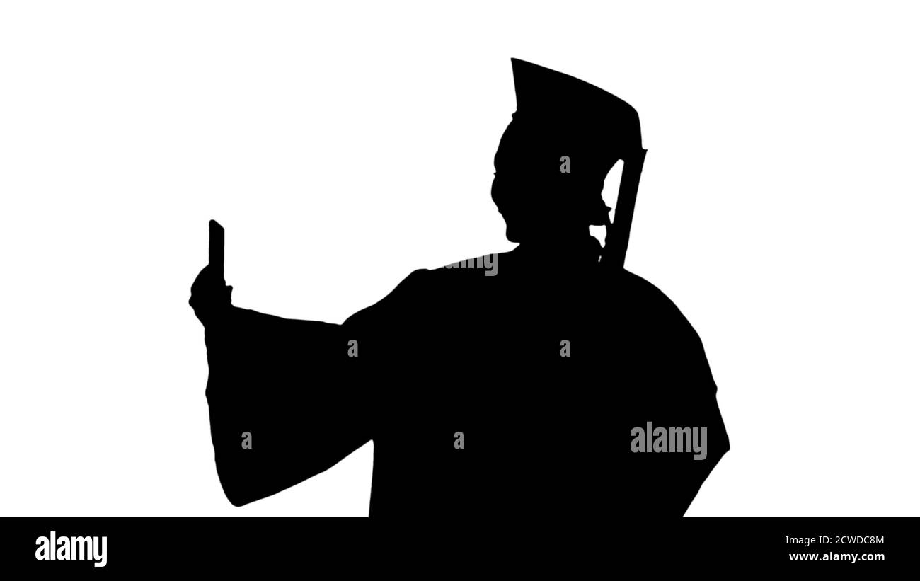 Silhouette Happy female graduate holding diploma and making self Stock ...