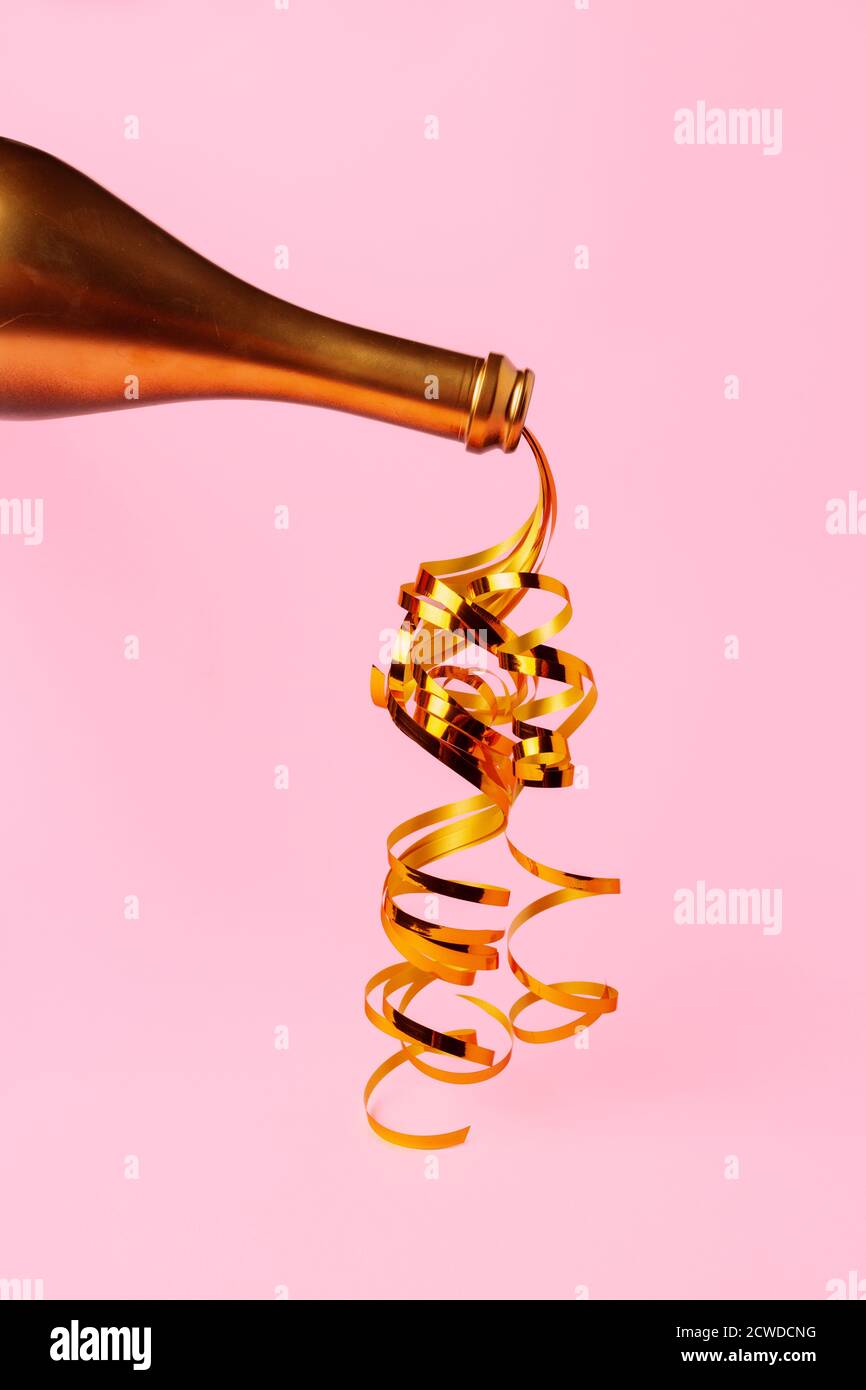 Champagne bottle with streamers flat lay top view Stock Photo - Alamy