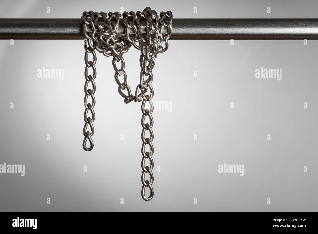 abstract stainless steel chain on the metal bar Stock Photo - Alamy