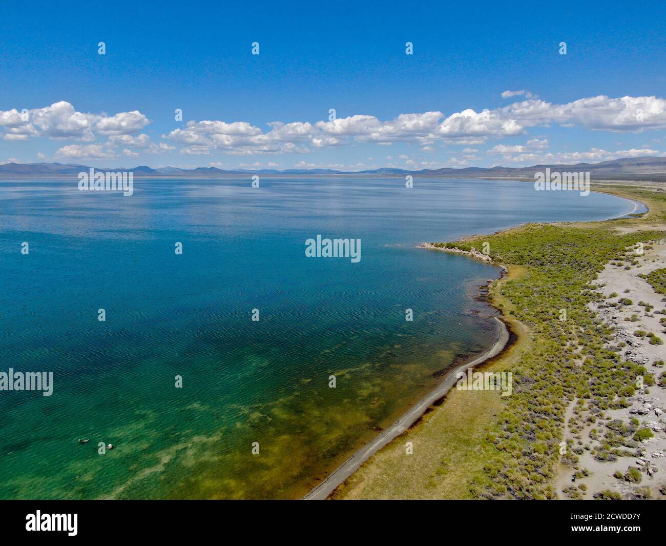 Aerial view of Mono Lake with tufa rock formations during summer season ...