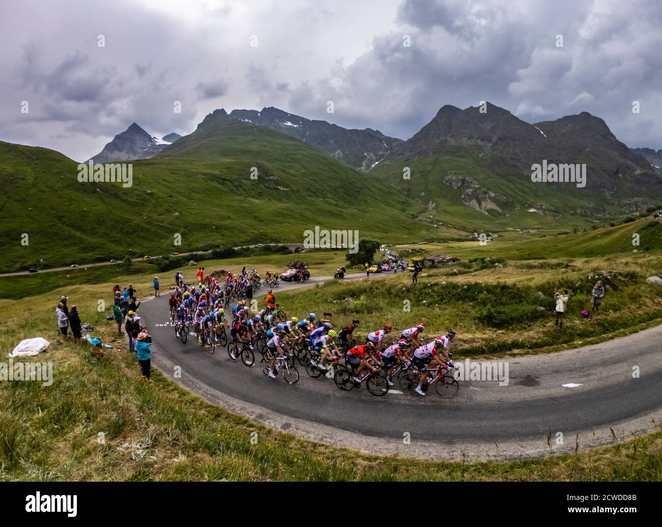 Col de Iseran, France - July 26, 2019: The Peloton climbing the road to ...