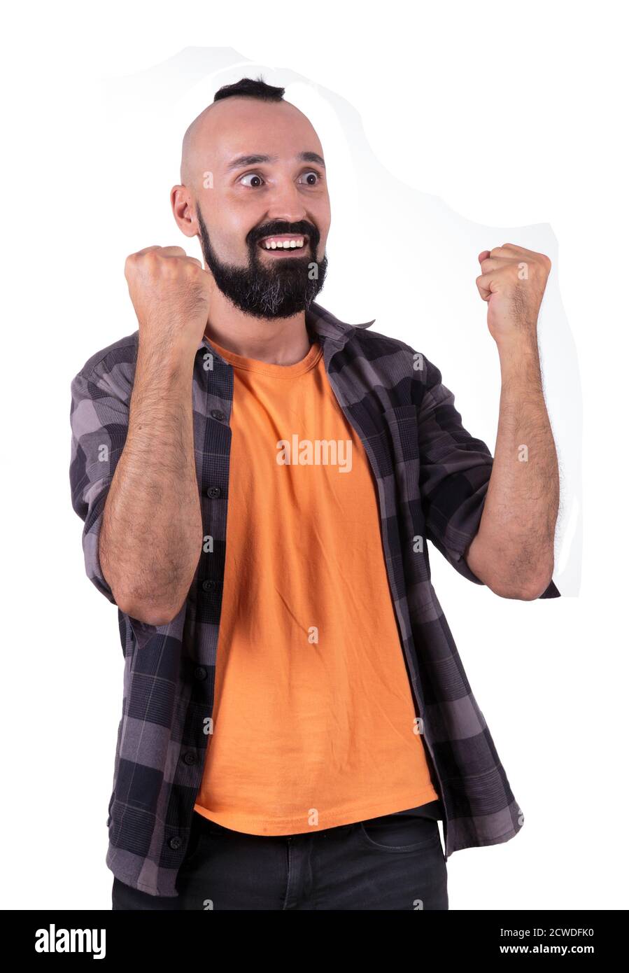 Excited young man celebrating a triumphant victory Stock Photo - Alamy Excited young man celebrating a triumphant victory Stock Photo - Alamy