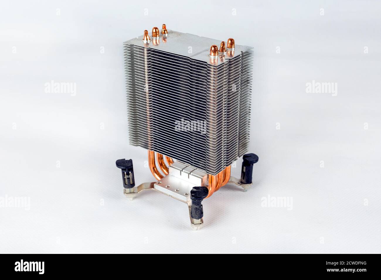 tower-type cpu cooler with copper heatpipes on white background Stock ...