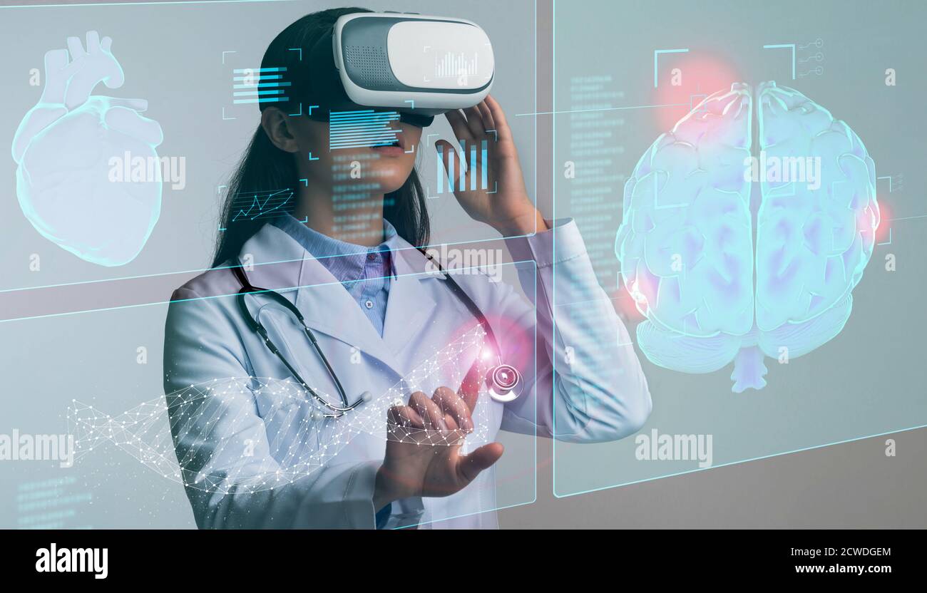 Doctor Woman Using Virtual Reality Headset, Studying Human Brain Stock ...