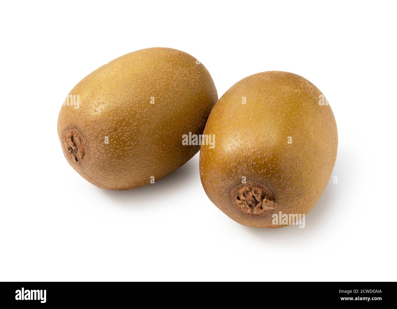 Two golden kiwis on a white background Stock Photo - Alamy