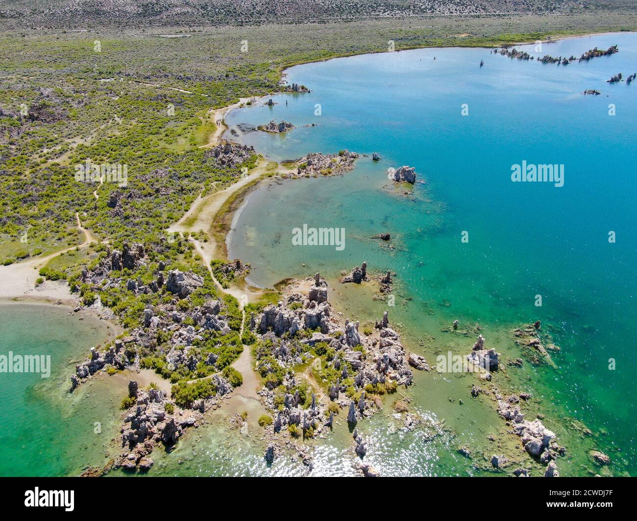 Aerial view of Mono Lake with tufa rock formations during summer season ...