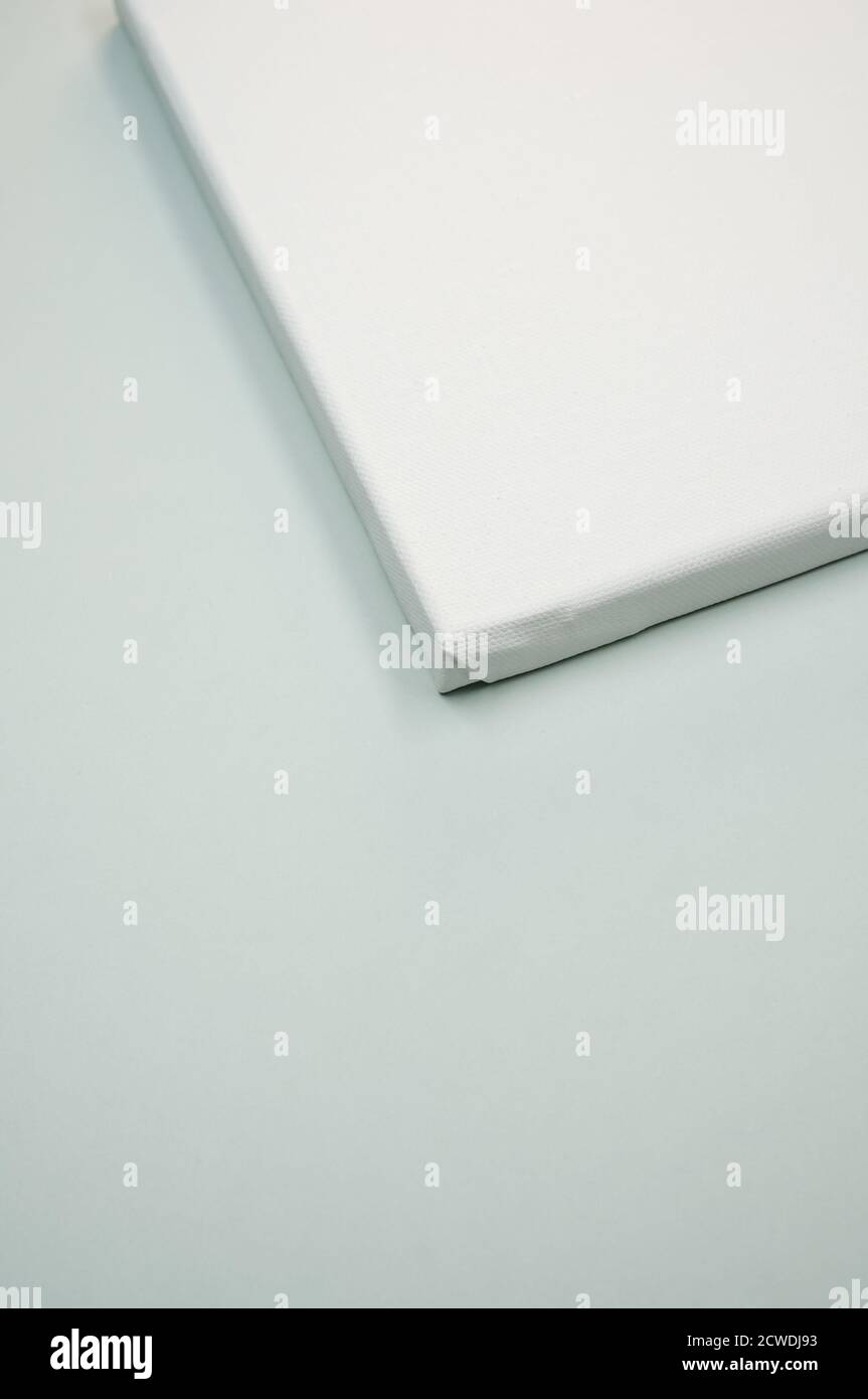 Top view of the white canvas on the gray surface Stock Photo - Alamy