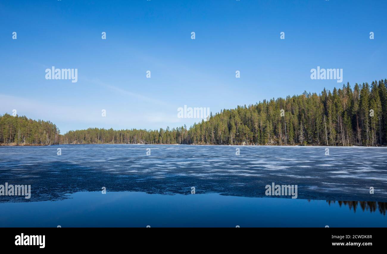 Melting ice on lake at Spring thaw, Finland Stock Photo - Alamy