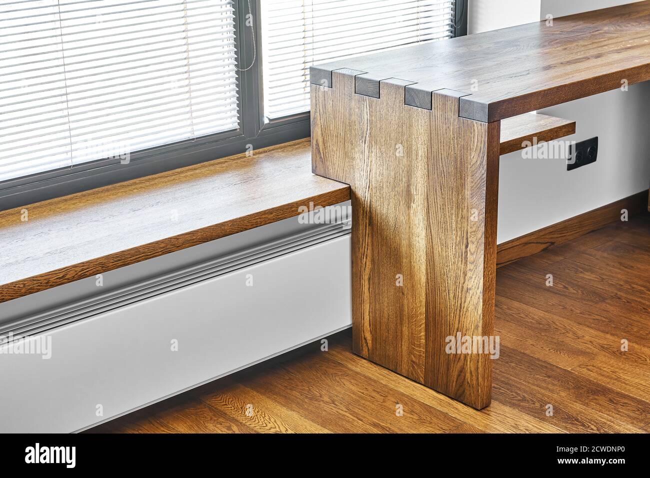 Modern furniture. Box joint solid wooden console desk against the ...