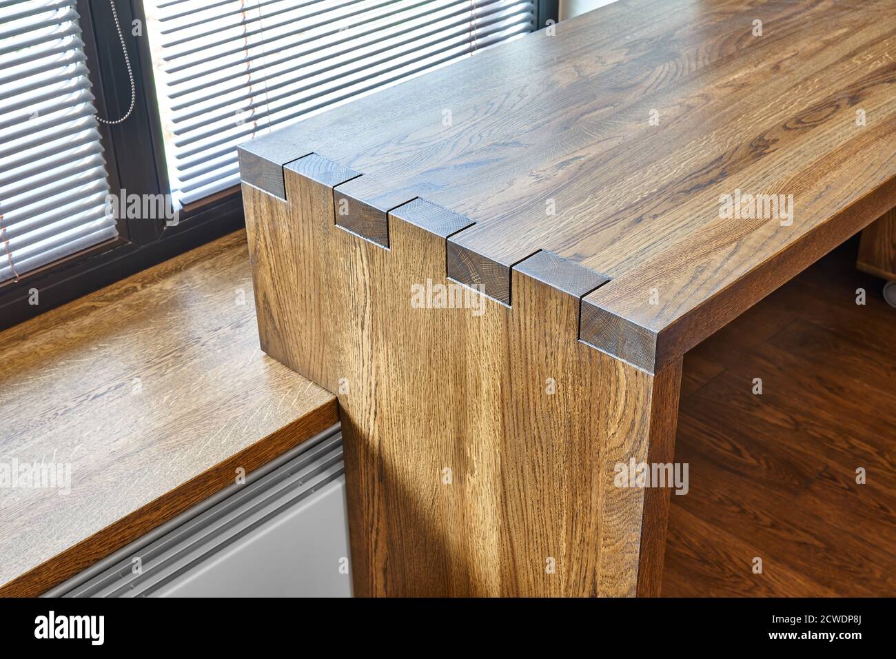 Modern furniture. Box joint solid wooden console desk against the ...