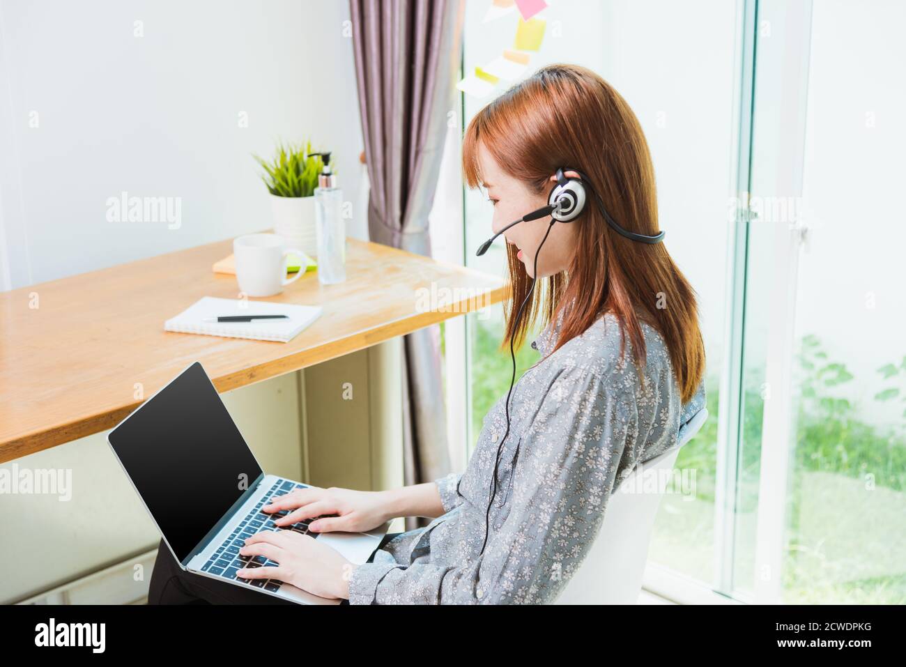 Work from home concept, Happy Asian beautiful young business woman ...