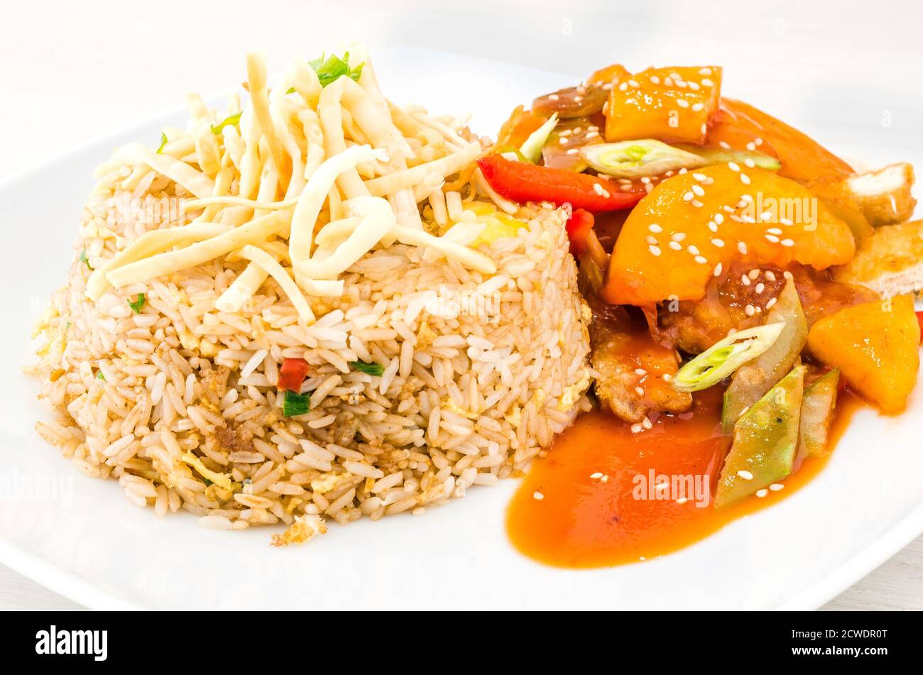 Chinese and Peruvian fusion food: chicken with peach and chaufa rice ...