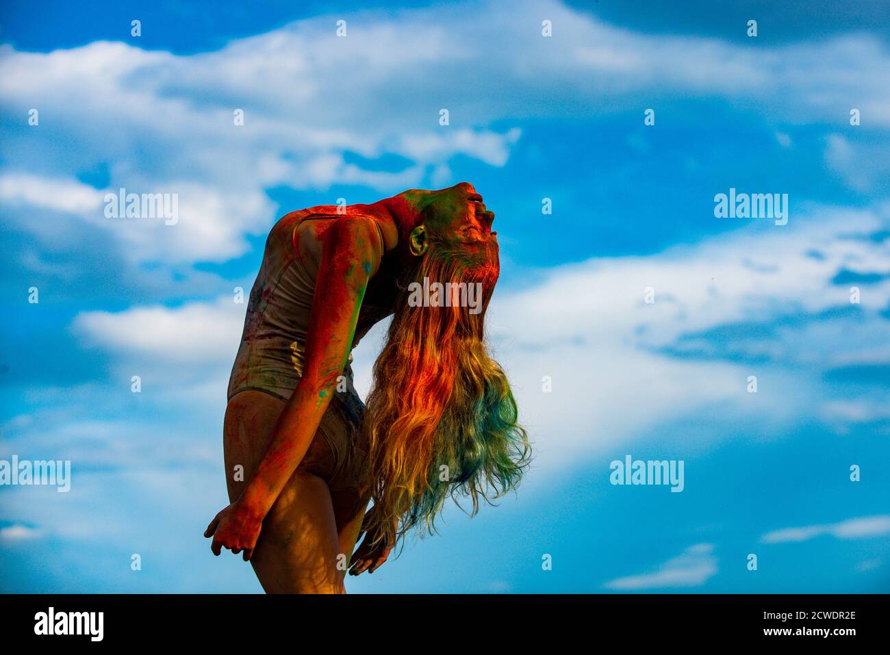 Beautiful young woman with amazing body-art color. Color womans body ...