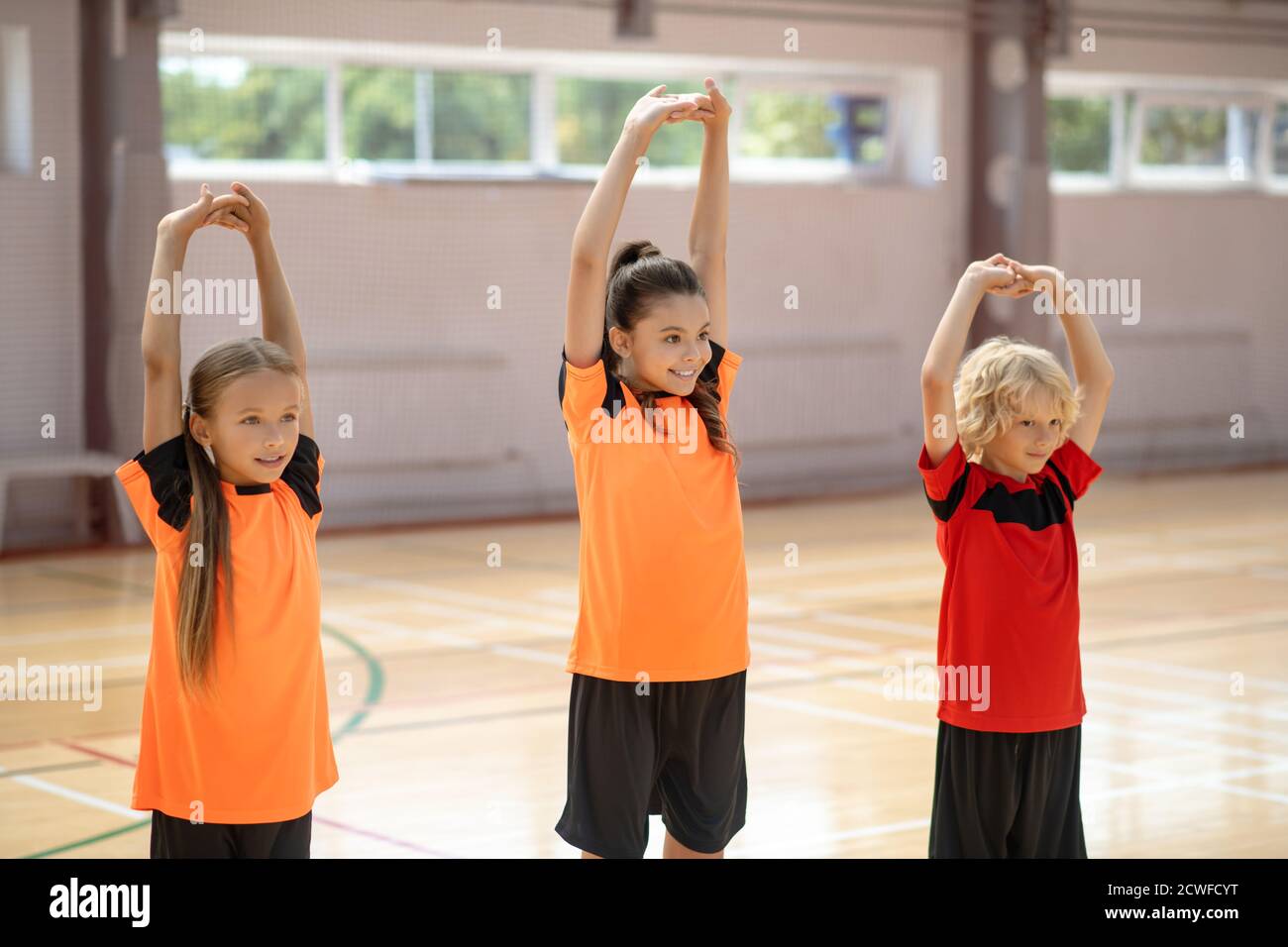 Kids stretching hi-res stock photography and images - Alamy