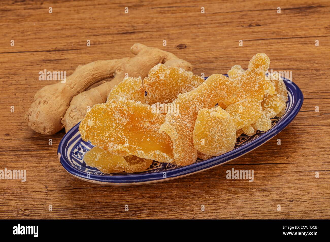Dry sweet ginger snack in the bowl Stock Photo - Alamy