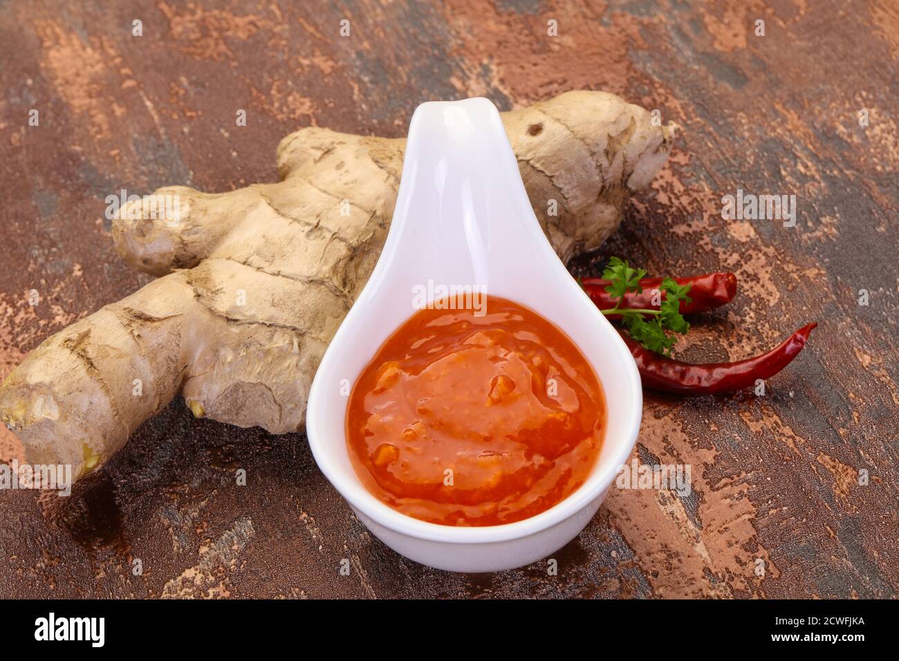 Ginger chili sauce with root and pepper Stock Photo - Alamy