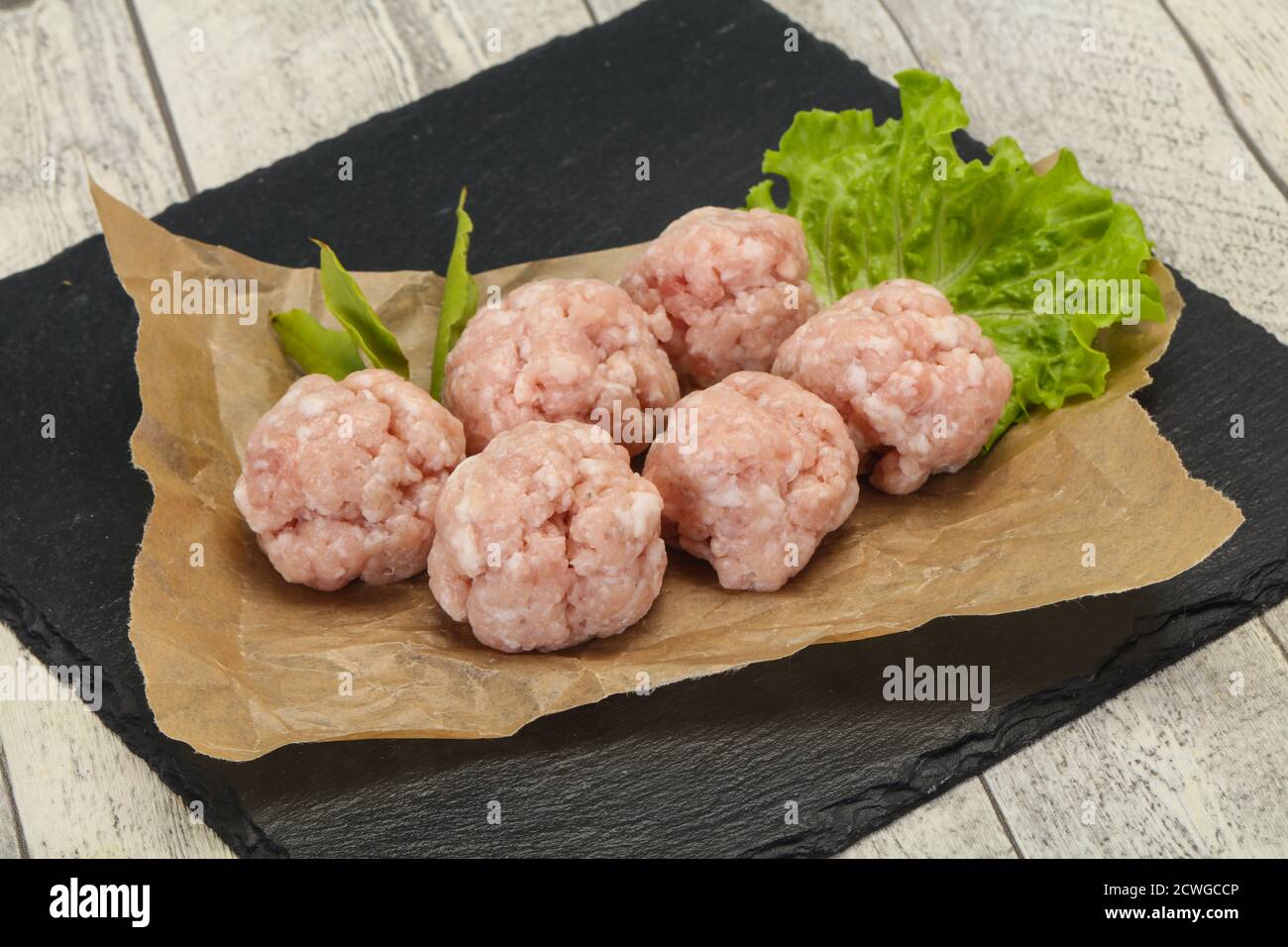 Homemade raw pork minced meatball ready for cooking Stock Photo - Alamy