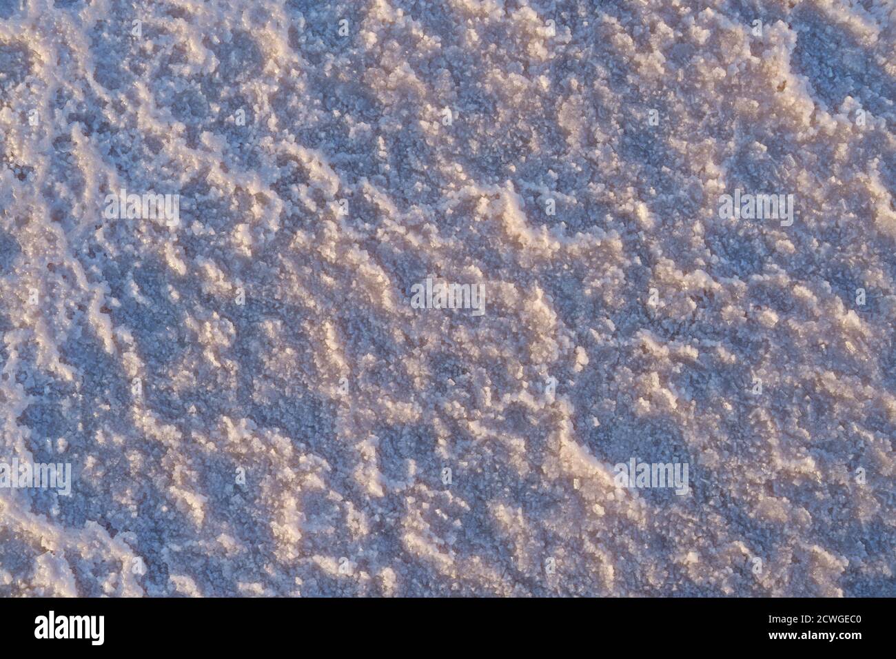 Crystals of pink salt natural background. Genichesk extremely salty ...