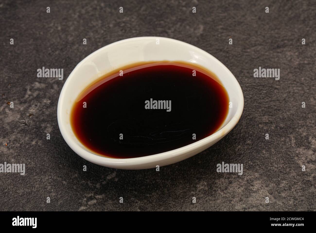 Asian cuisine - soya sauce in the bowl Stock Photo - Alamy