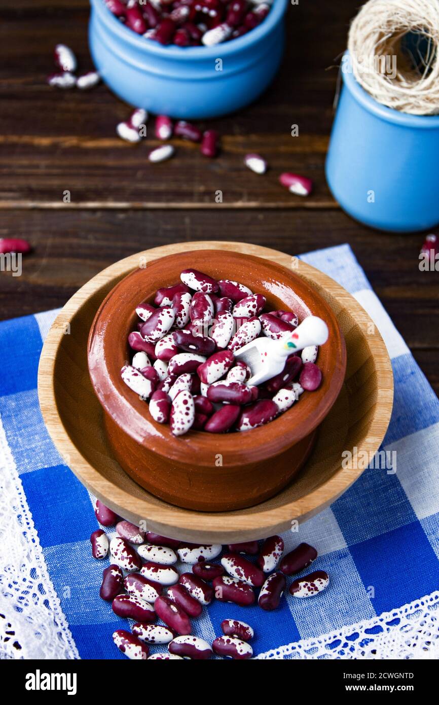 Violet with dots beans in ceramic bowl. Swallow beans. Vegetables for ...