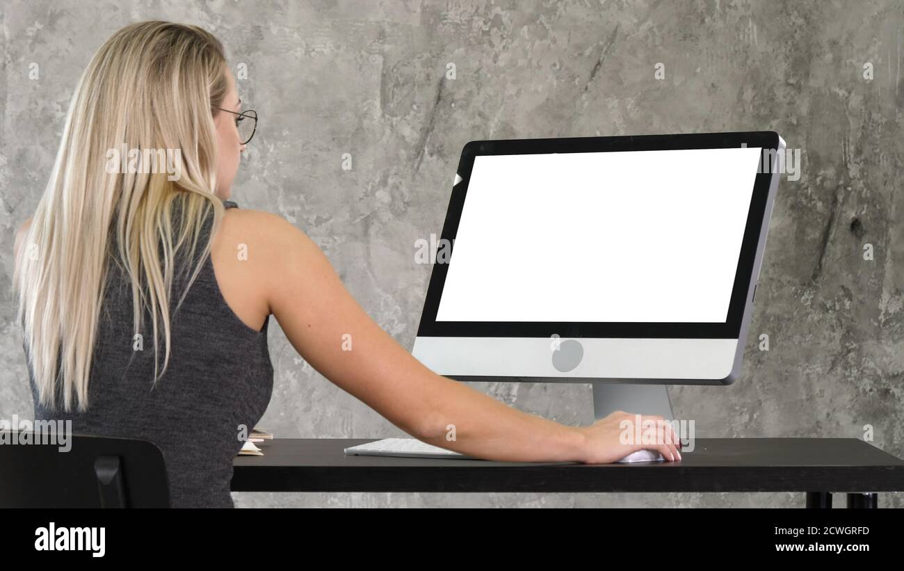 Young friendly operator woman talking and working on the compute Stock ...