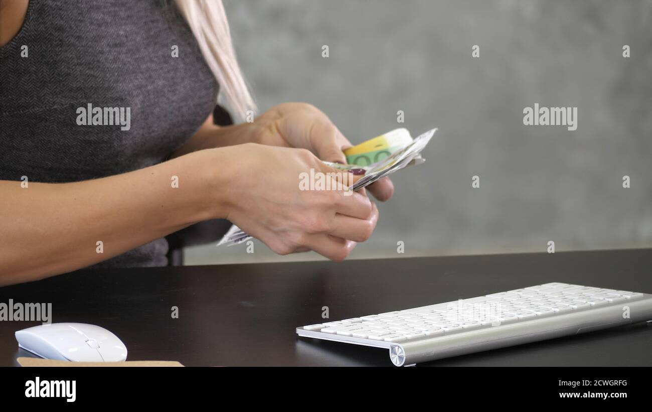 Hands counting money Euro on the desk Stock Photo - Alamy