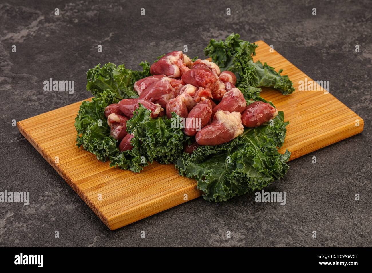 Raw chicken hearts heap for cooking Stock Photo - Alamy