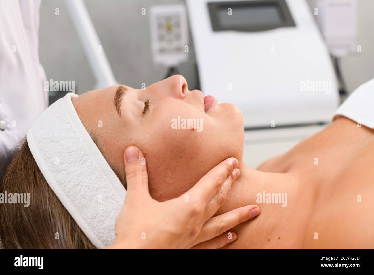 Woman under facial spa procedure hi-res stock photography and images ...