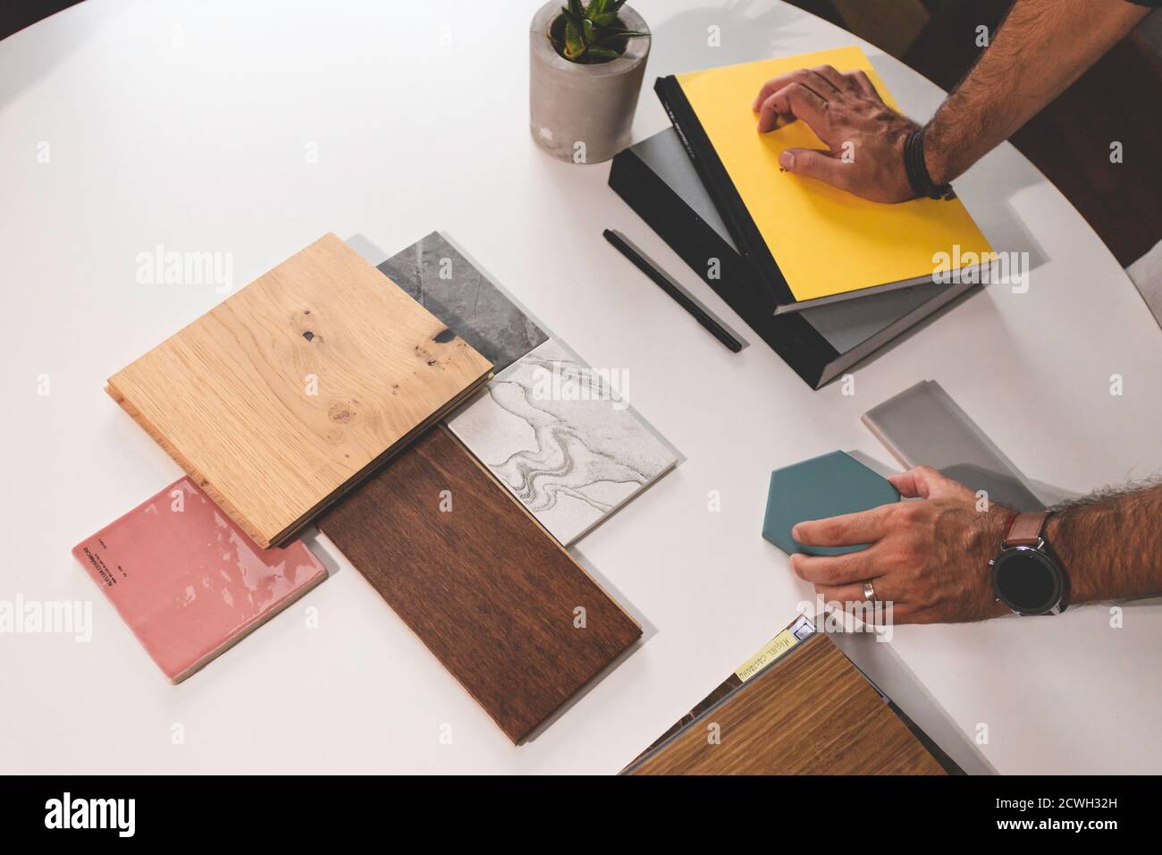 Close up of hands on the table during an office presentation with three ...