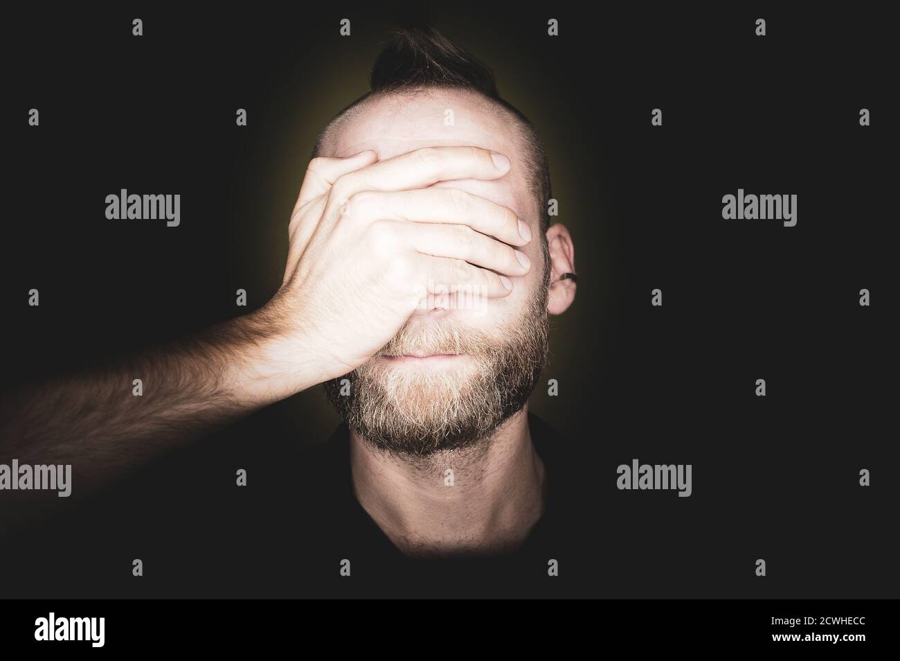 Man covered eyes hi-res stock photography and images - Alamy